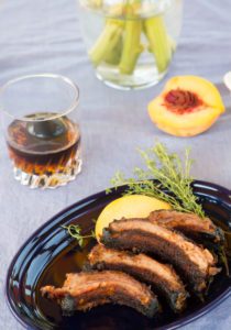 Tender and Juicy Bourbon Peach Grilled Ribs - Deliciously Plated