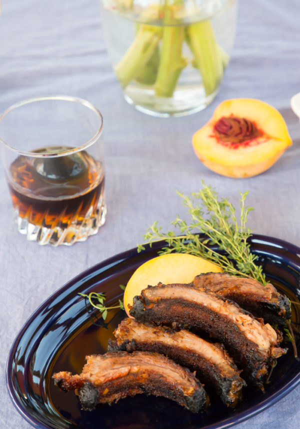Tender and Juicy Bourbon Peach Grilled Ribs - Deliciously Plated
